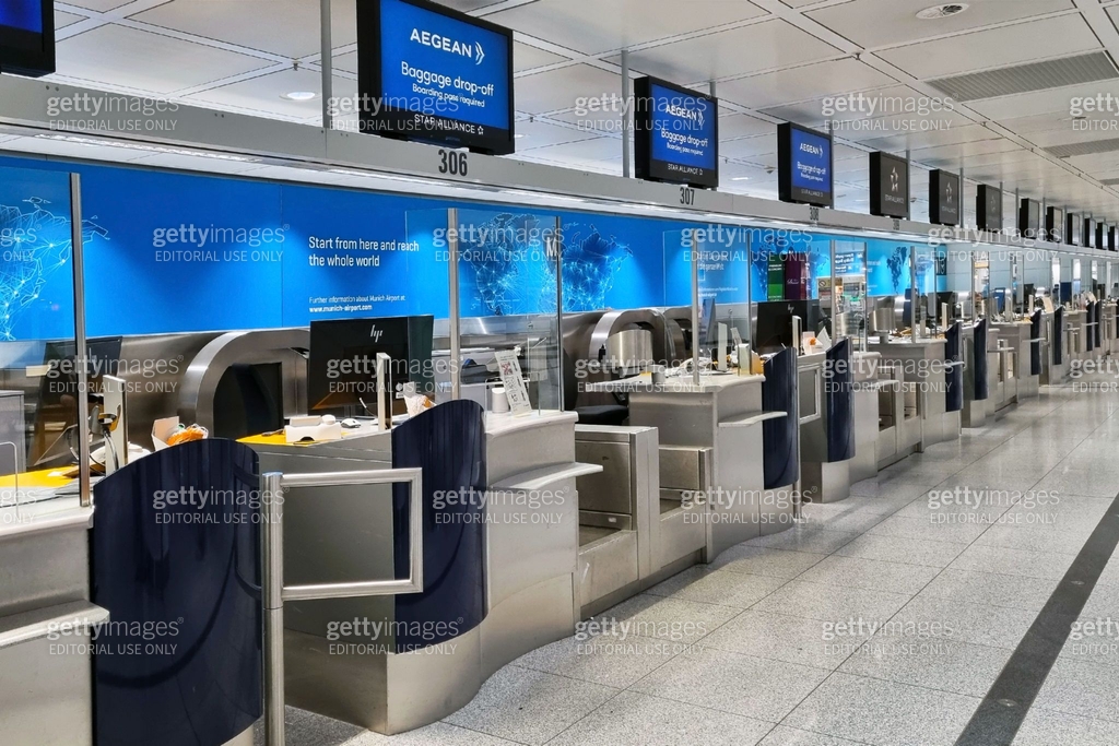 Empty Airport Check-In Counters with Digital Signage for Efficient ... Empty Airport Check-In Counters with Digital Signage for Efficient ...