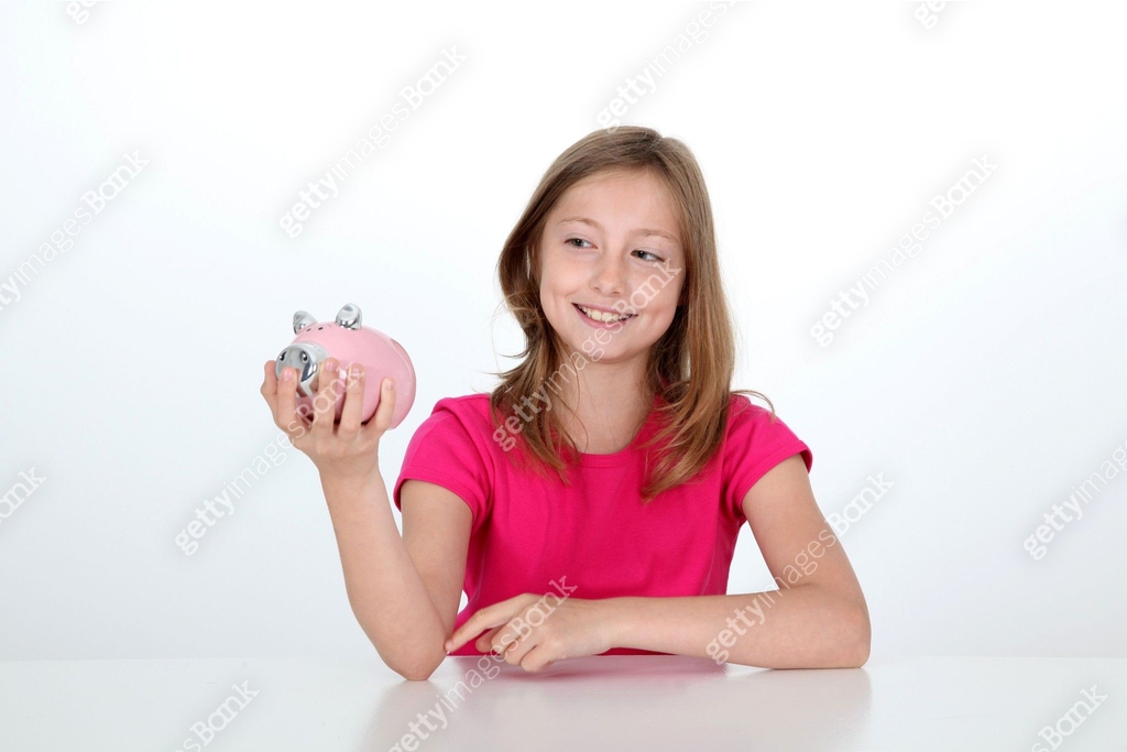 Smiling young girl holding piggy bank 이미지 (a10859794) - 게티이미지뱅크 Smiling young girl holding piggy bank 이미지 (a10859794) - 게티이미지뱅크