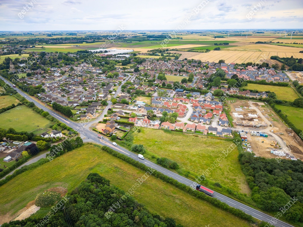 Aerial view of a typical British road bypass seen next to an East ... Aerial view of a typical British road bypass seen next to an East ...